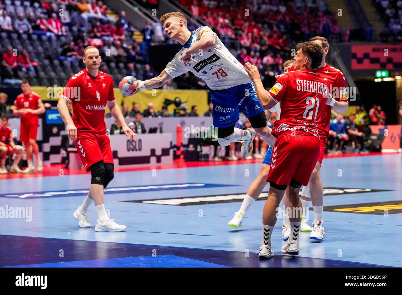The Faroe Islands' Oli Mittun, centre, challenges with Switzerland's ...