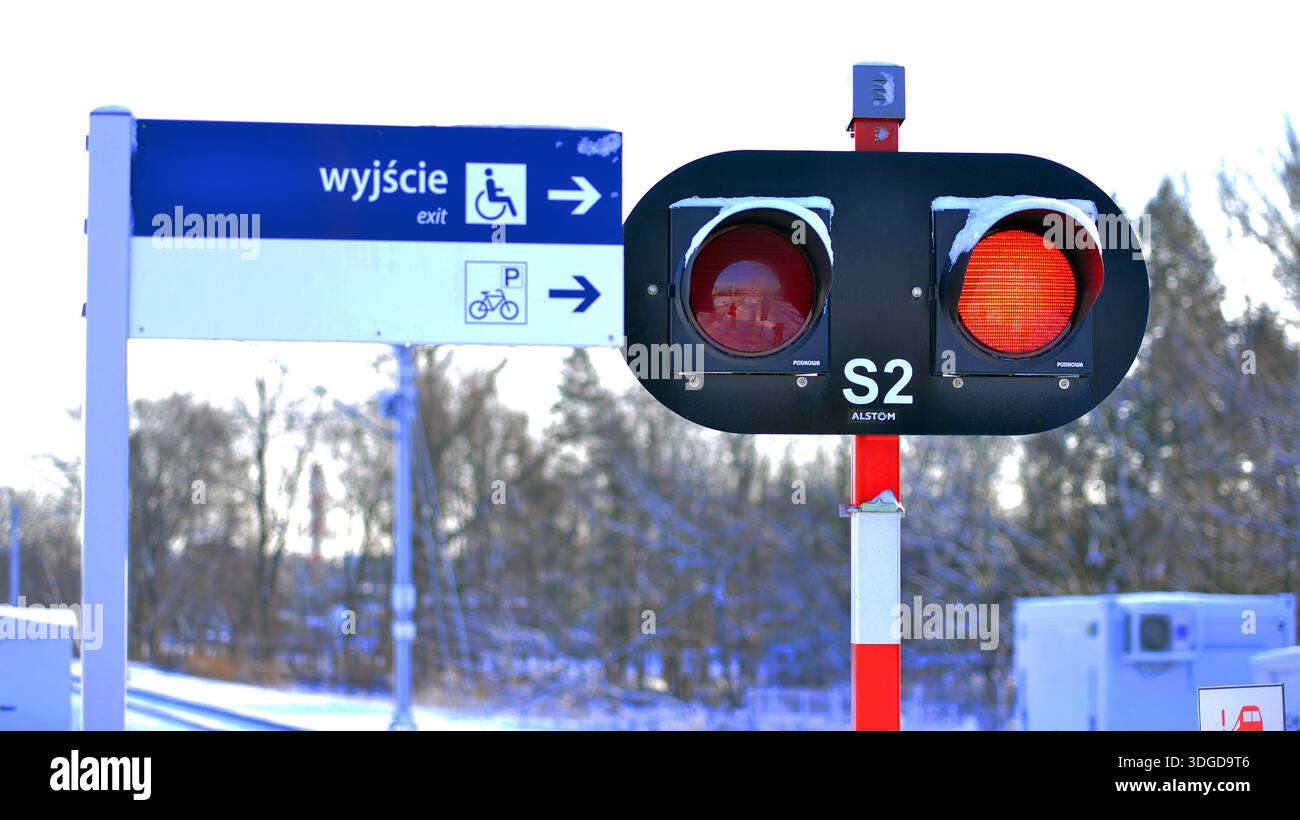 Warsaw, Poland. 15 January 2026. Traffic light at the railway crossing ...