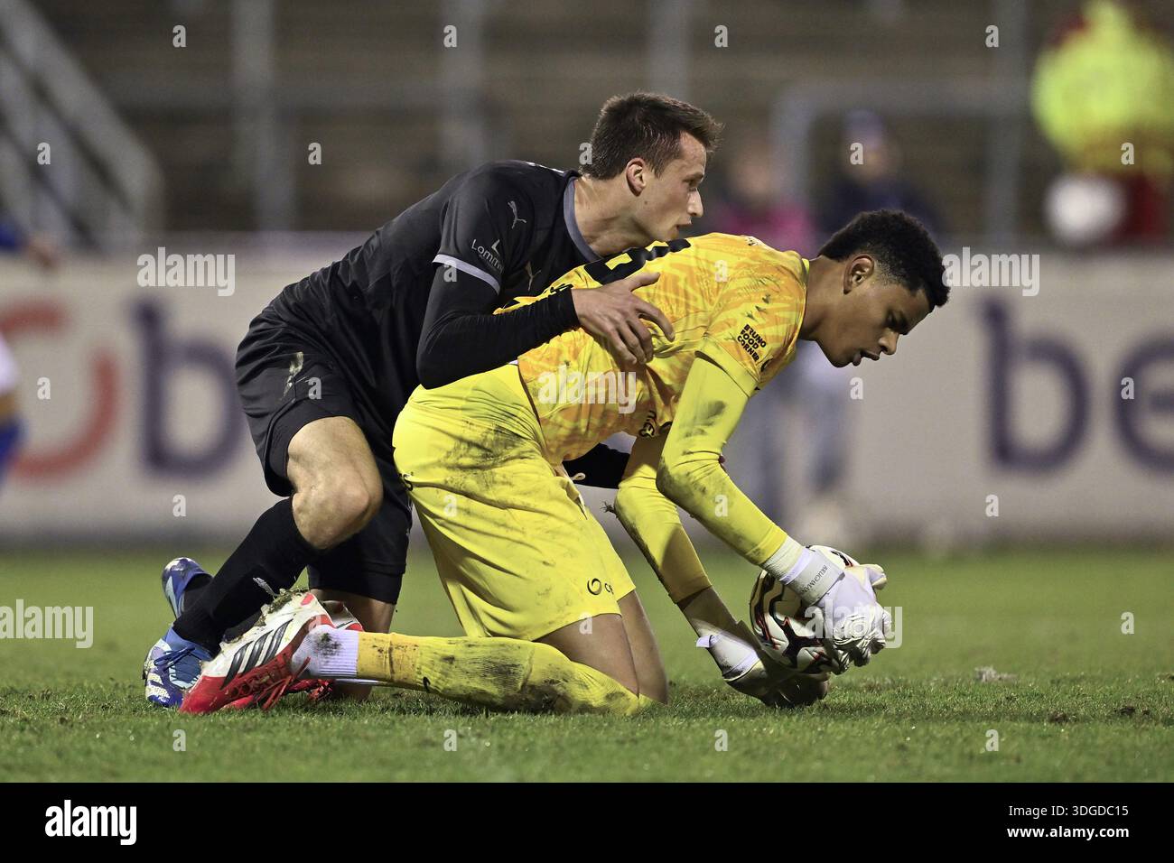 Geel, Belgium. 16th Jan, 2026. Lommel's Lucas Schoofs and Jong Genk's ...