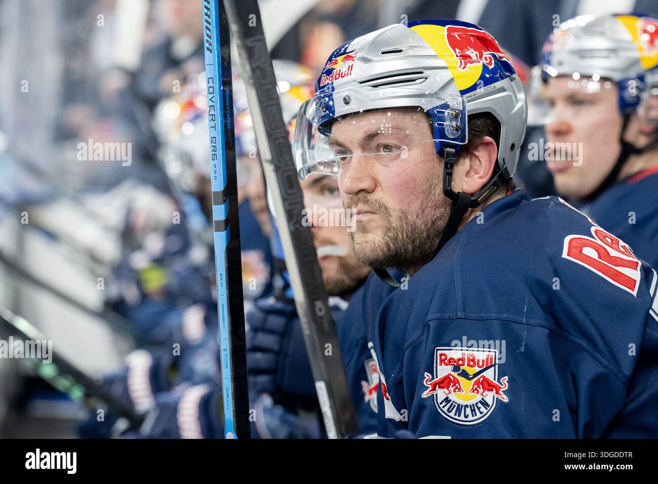 Conrad Abeltshauser (EHC Red Bull Muenchen, #16) sitting on the bench ...