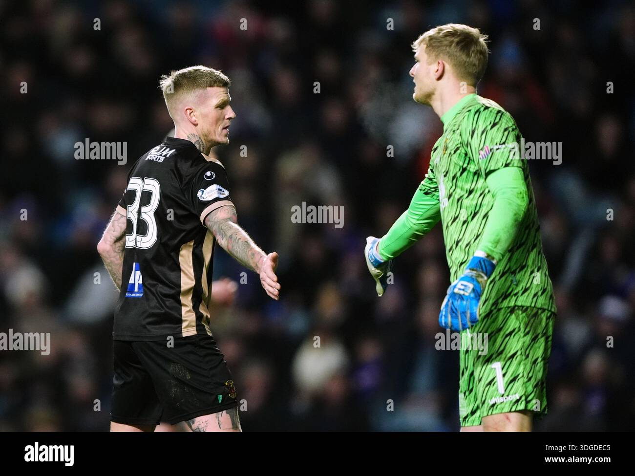 Annan Athletic manager Wullie Gibson greets goalkeeper Charlie Albinson ...