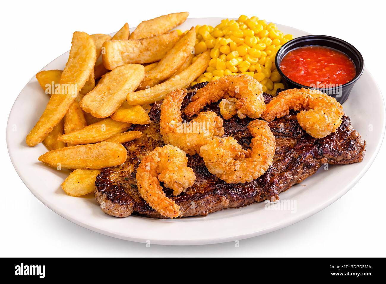 Surf and turf steak dinner with fries and sweetcorn - White background ...