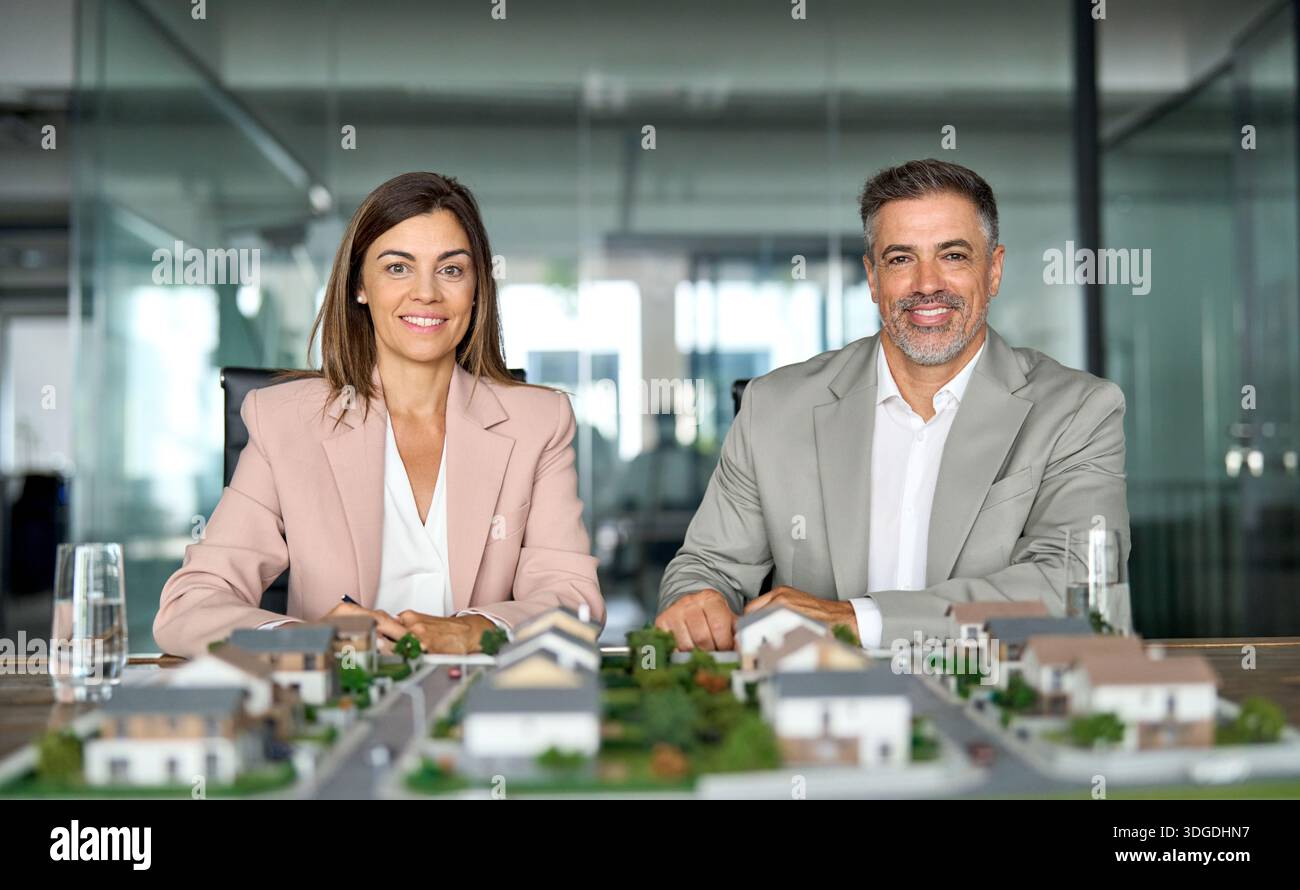 Real estate developers presenting new development construction project ...