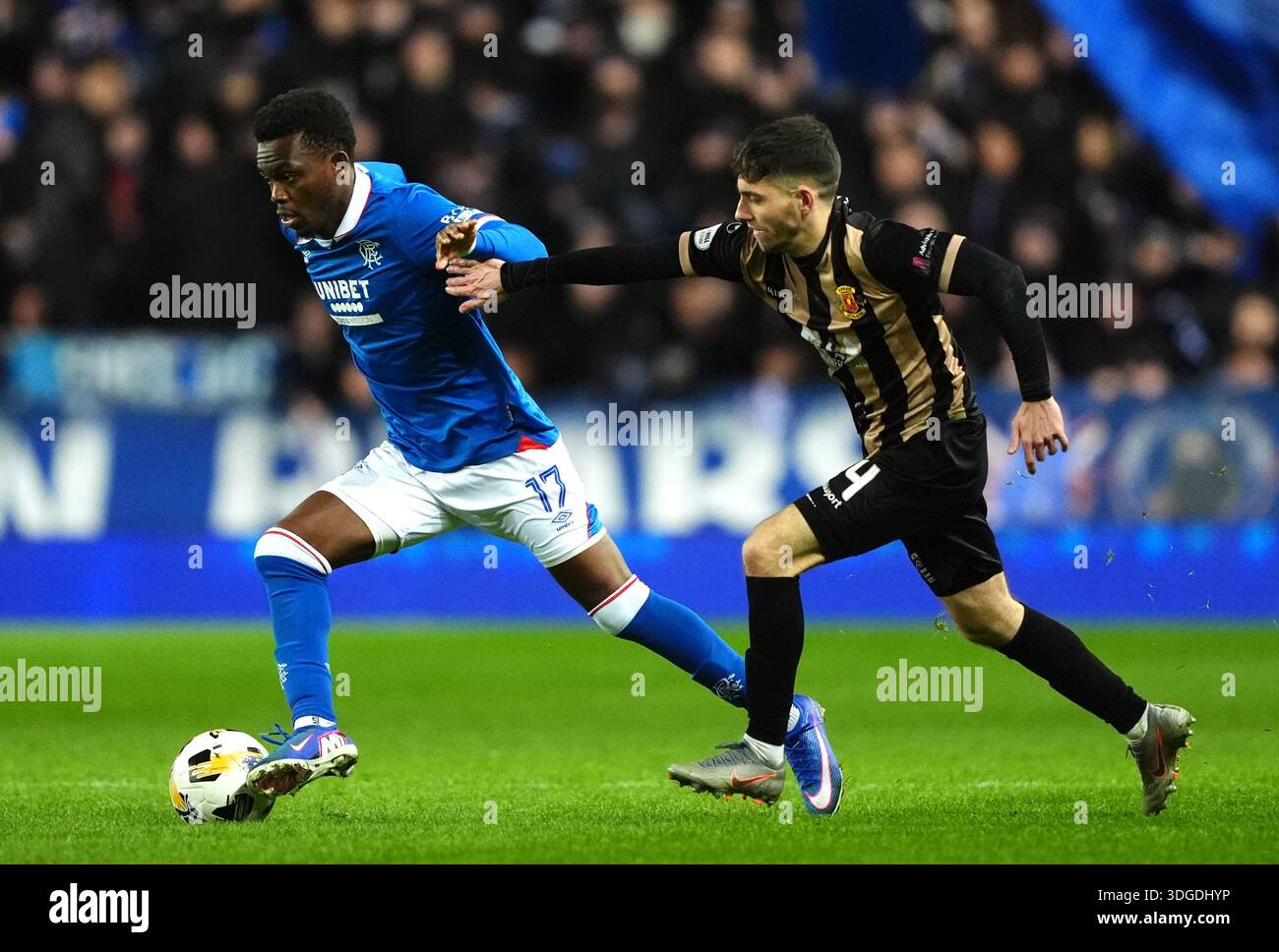 Rangers' Rabbi Matondo (left) and Annan Athletic's Zander Craik battle ...