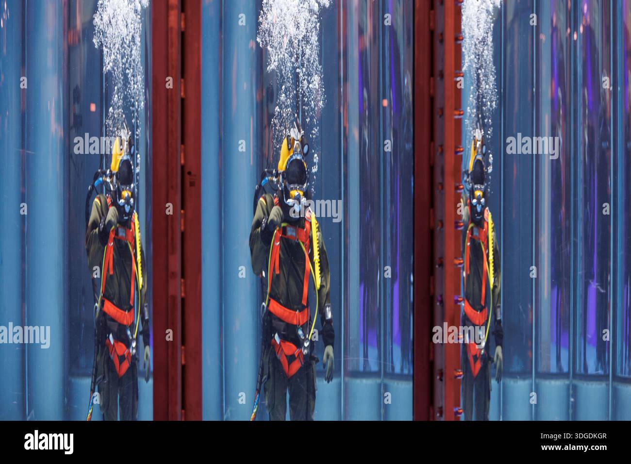 A diver wearing historic helmet diving equipment takes part in a ...