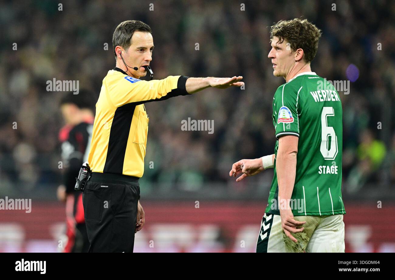 From left: referee Benjamin Brand, Jens Stage (Bremen) Bremen, January ...