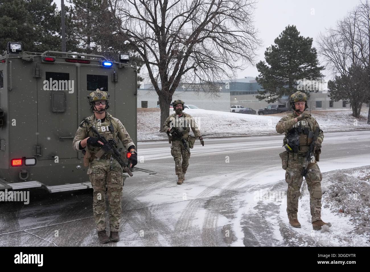 FBI officers work a scene on Friday, Jan. 16, 2026, in St. Paul, Minn ...