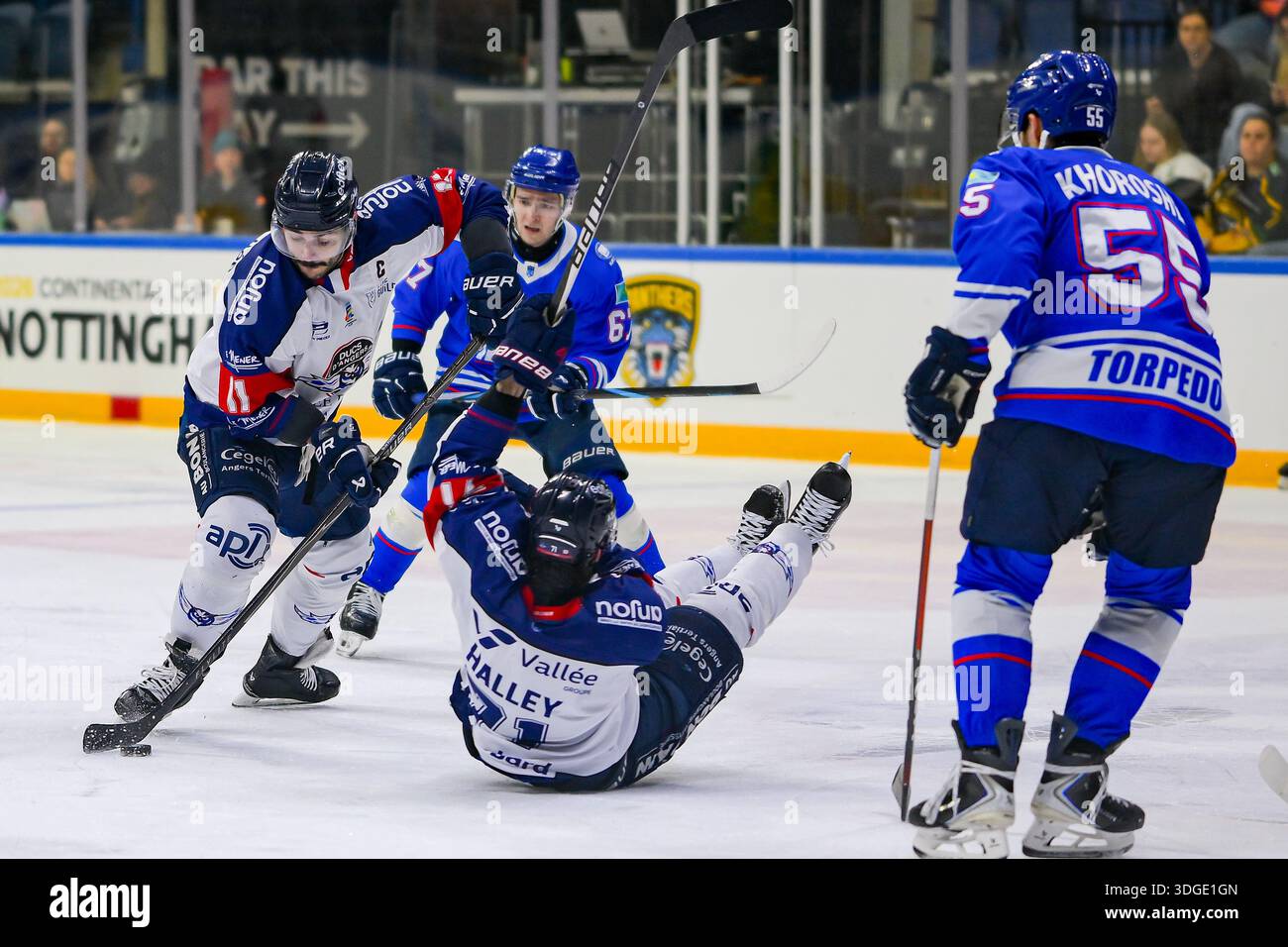 Robin Gaborit of Angers take the puck as his teammate Philippe Halley ...