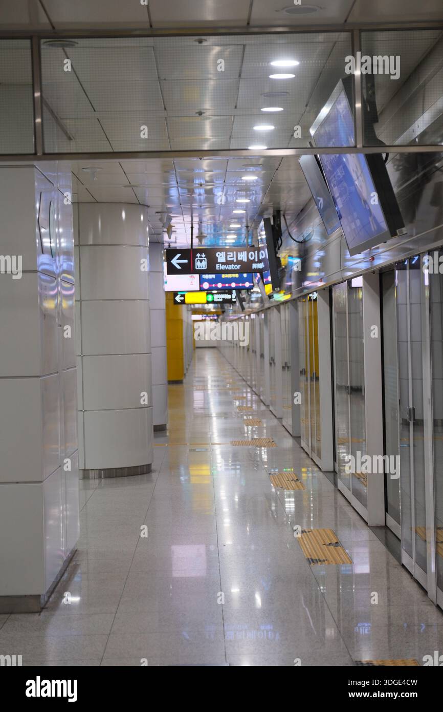 Seoul, South Korea: Empty subway platform corridor with platform screen ...