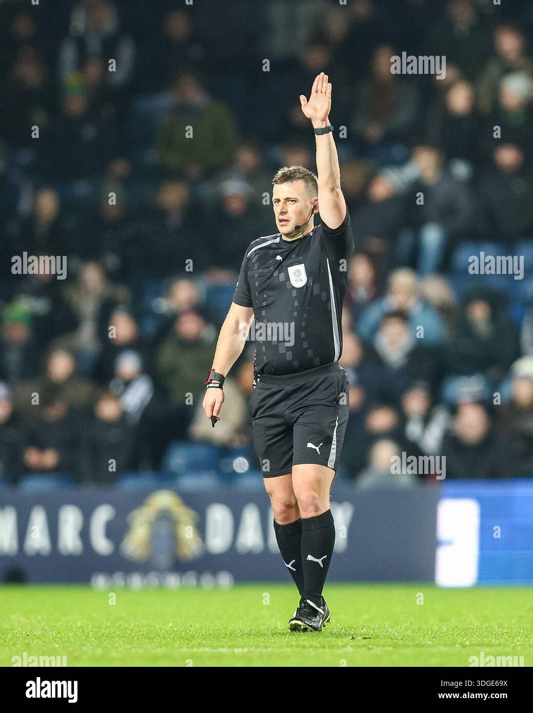 Referee, Josh Smith signals during the Sky Bet Championship match ...