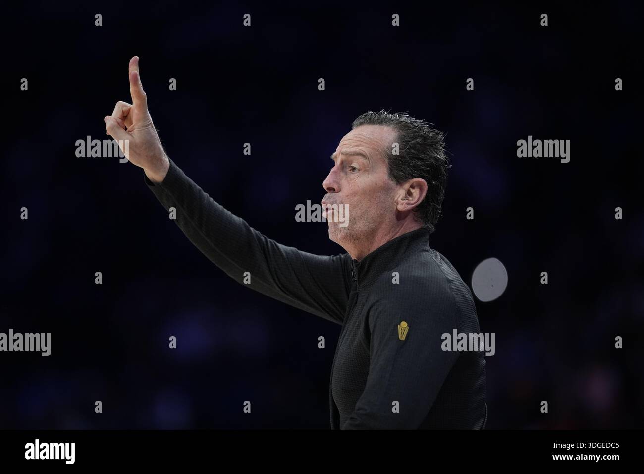 Cleveland Cavaliers' Kenny Atkinson coaches during an NBA basketball ...