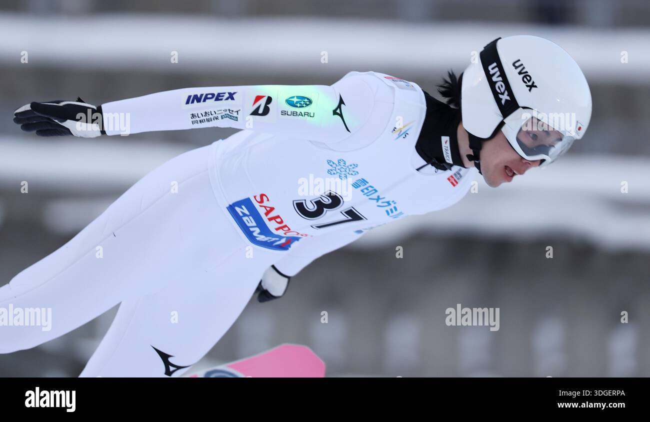NAKAMURA Naoki of Japan soars in the air during the first round of the ...
