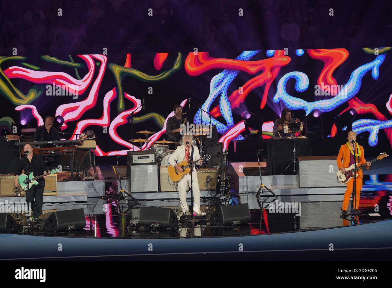 Neil Finn, centre, lead singer of Crowded House performs during the ...