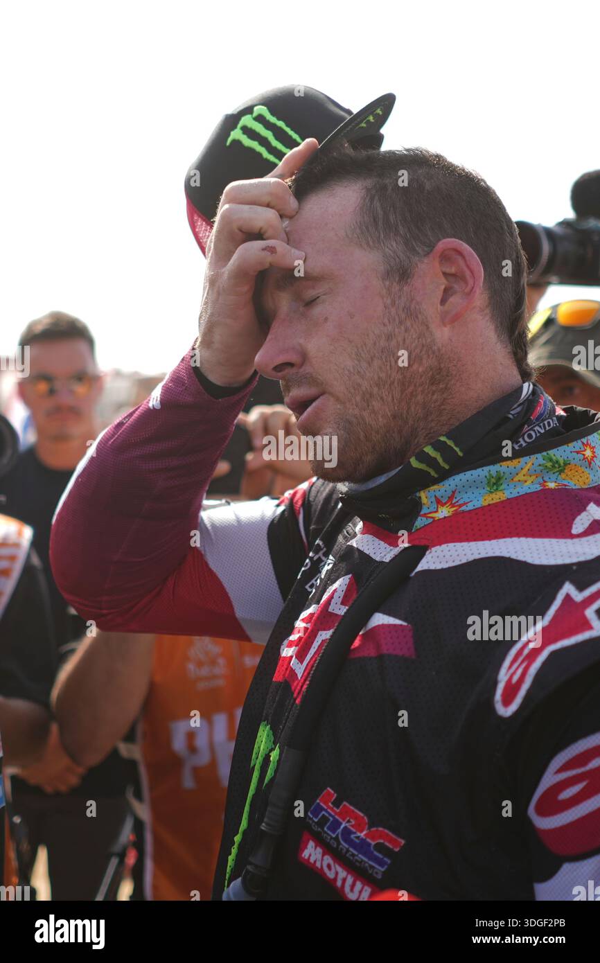 Rider Ricky Brabec of the U.S. reacts after the thirteenth stage with a ...