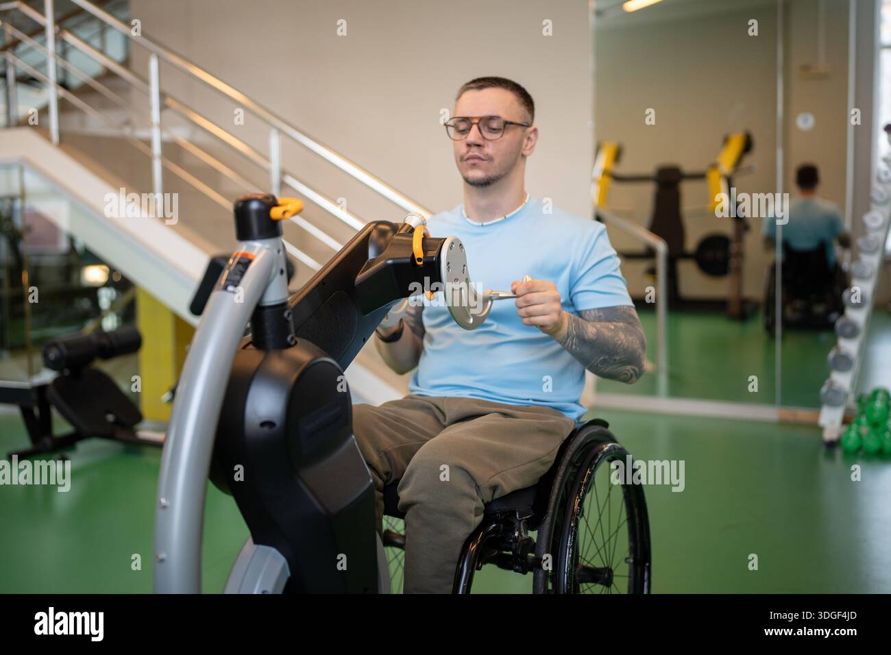 Man using wheelchair shows hi-res stock photography and images - Alamy