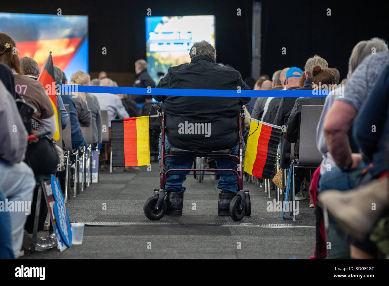 Idar Oberstein, Germany. 16th Jan, 2026. A man sits on a walking frame ...