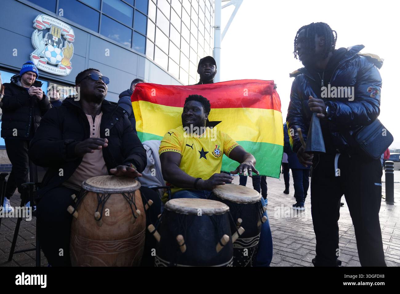 A group of musician play outside before the Sky Bet Championship match ...