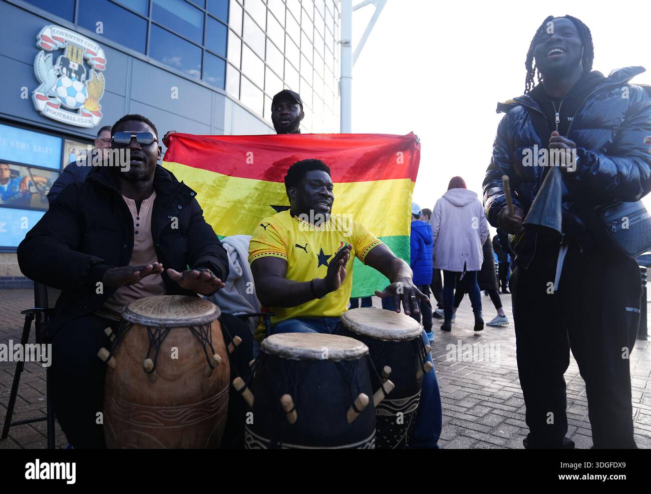 A group of musician play outside before the Sky Bet Championship match ...
