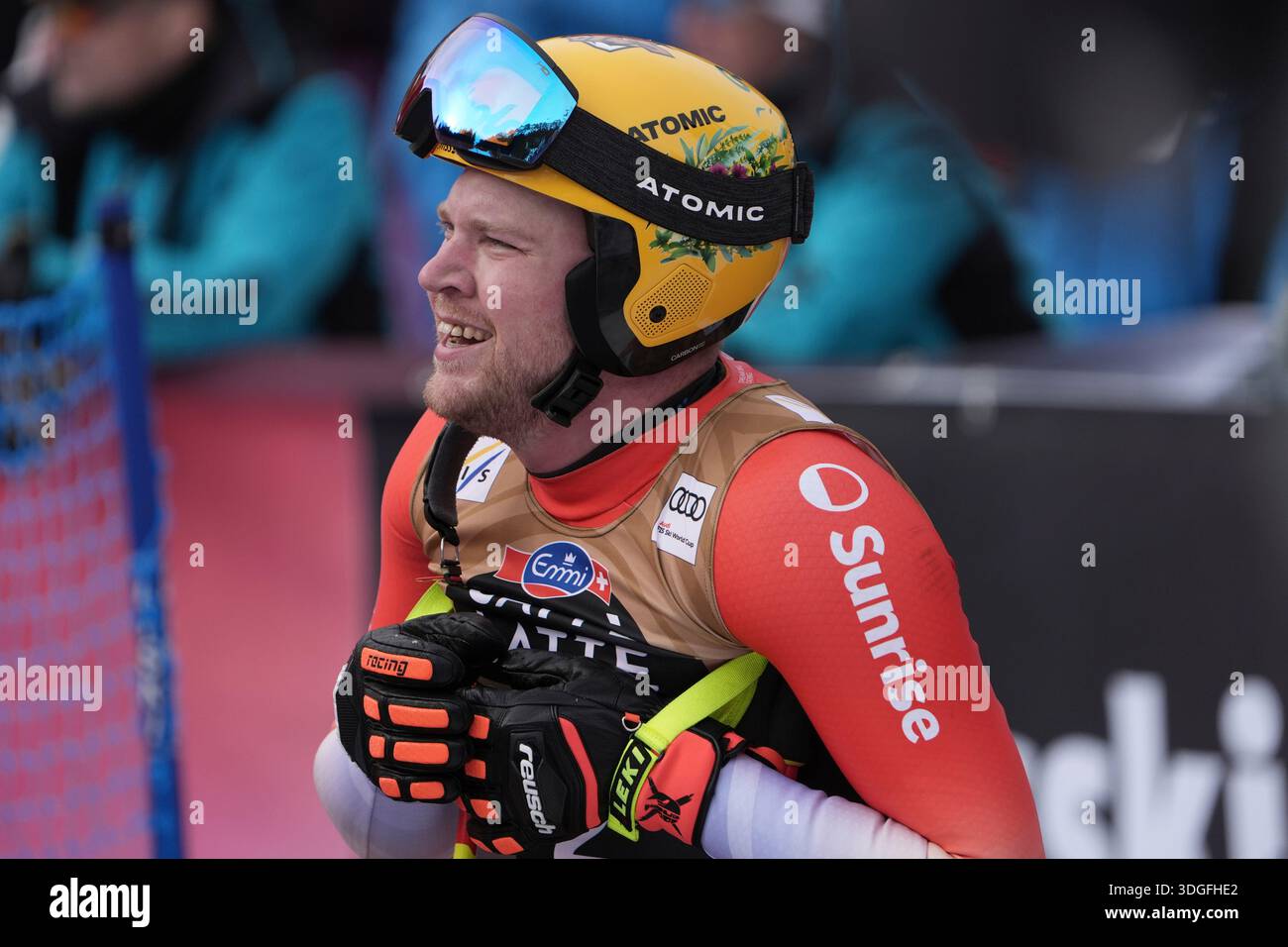 Switzerland's Niels Hintermann checks his time at the finish area of an ...