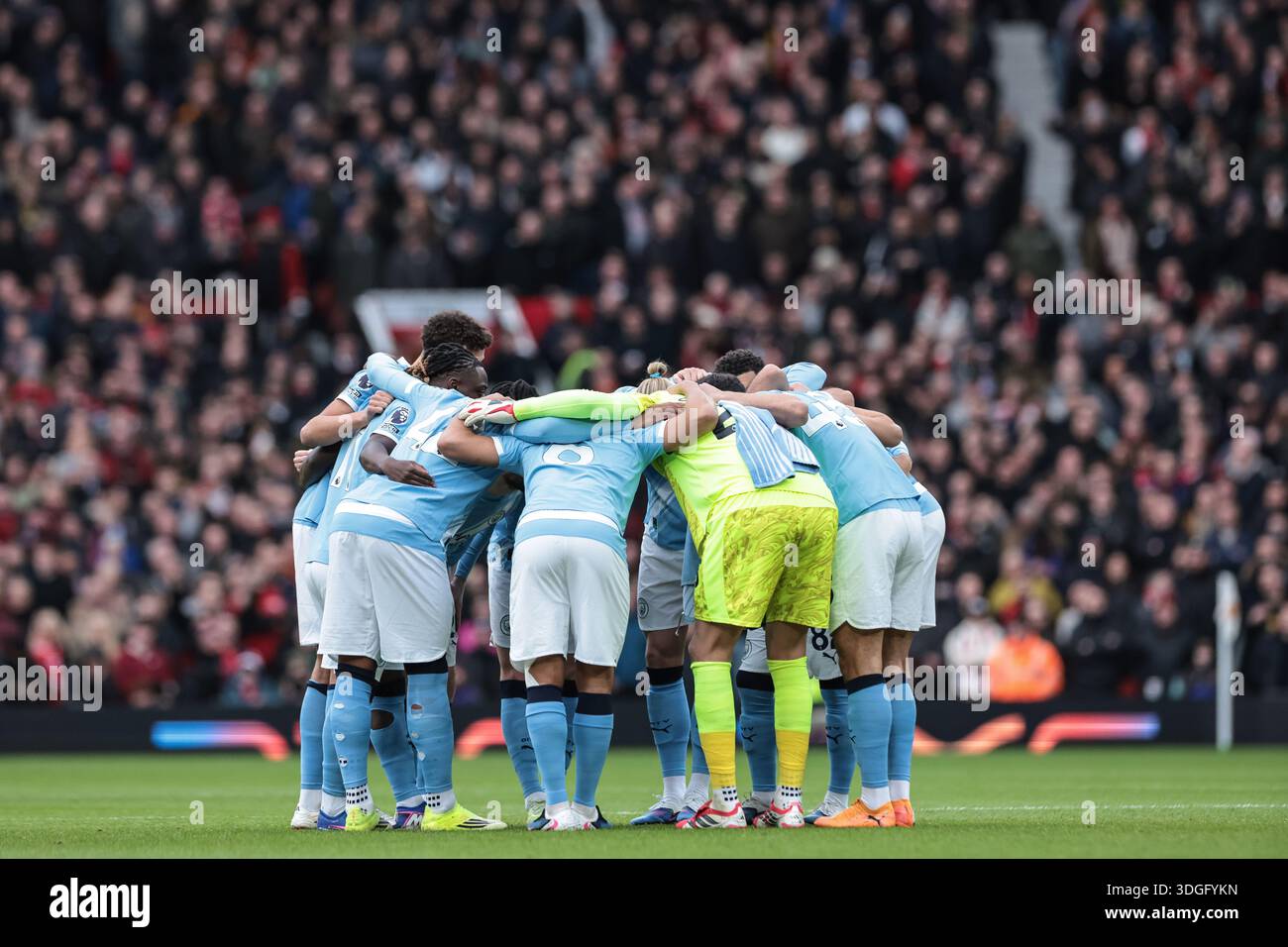 Manchester City team huddle during the Premier League match Manchester ...