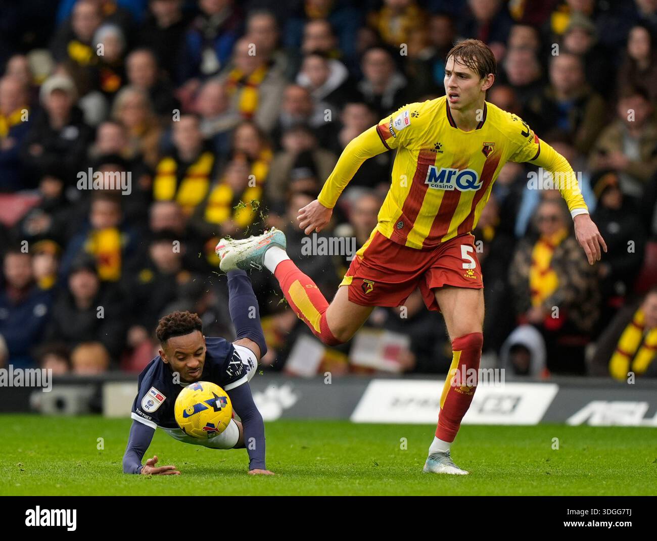 Millwall's Thierno Ballo is fouled by Watford's Hector Kyprianou during ...