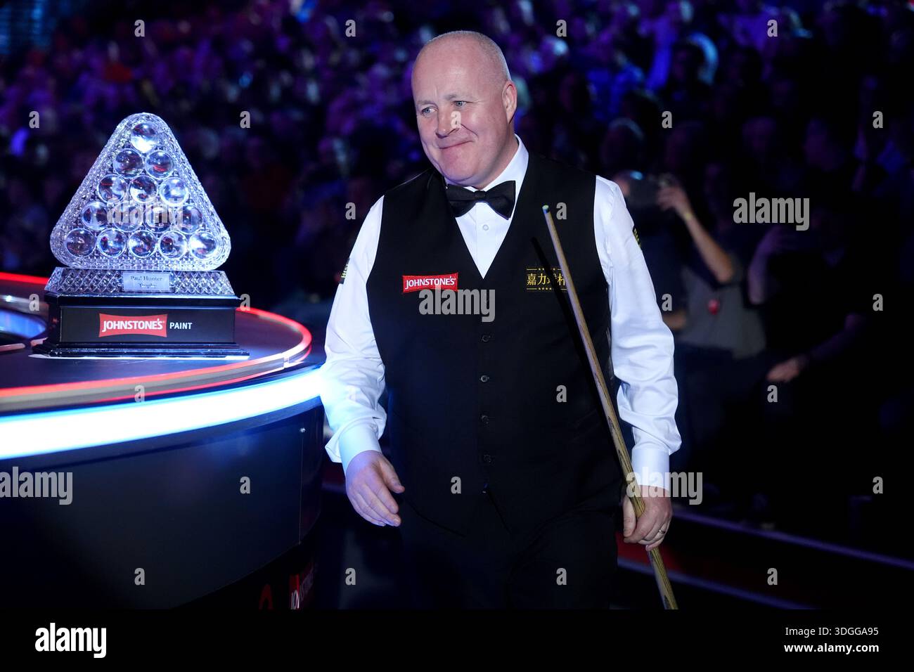 John Higgins walks out for the start of his match against Judd Trump on ...