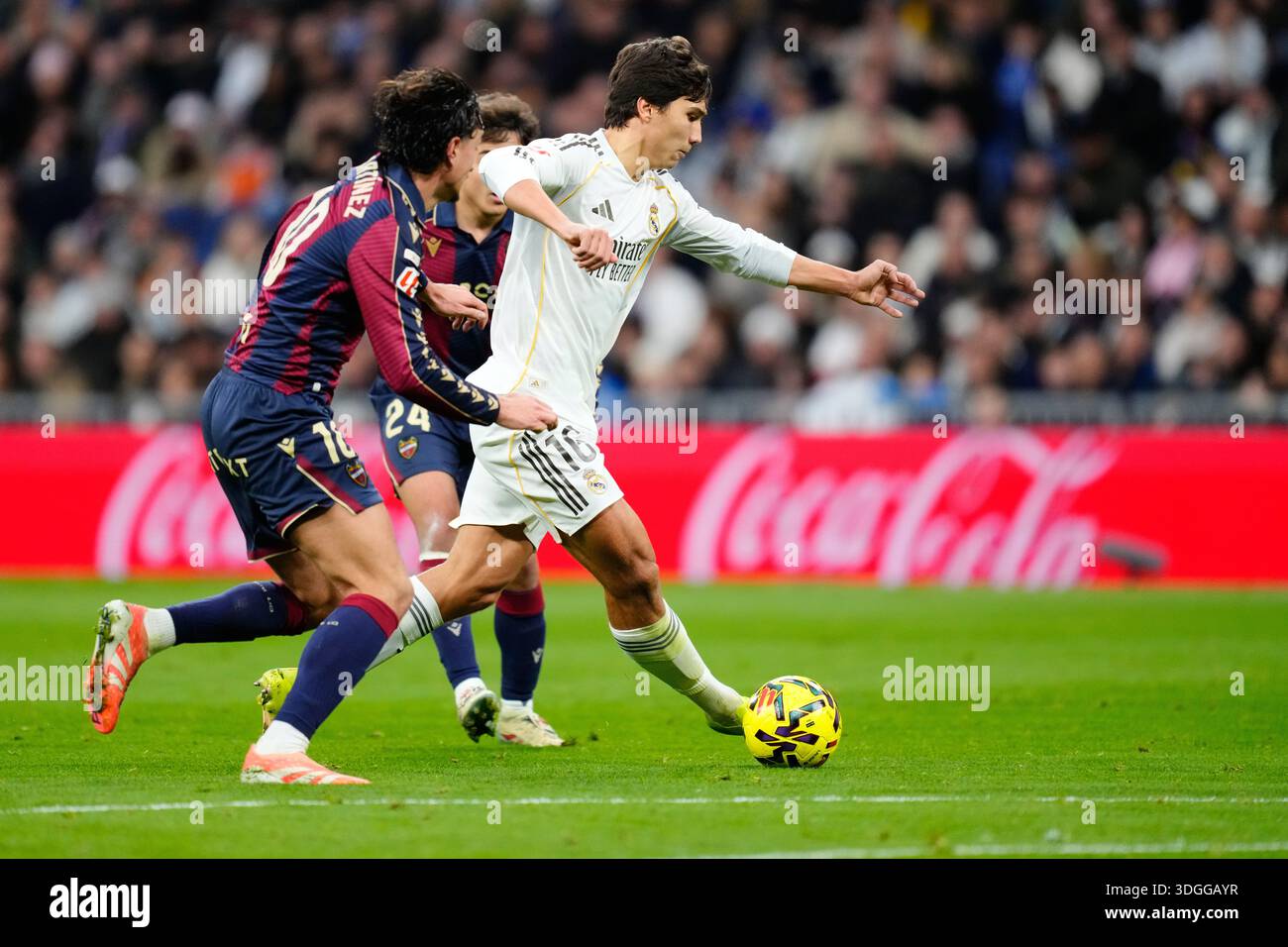 Real Madrid's Gonzalo Garcia, right, and Levantes' Pablo Martinez vie ...