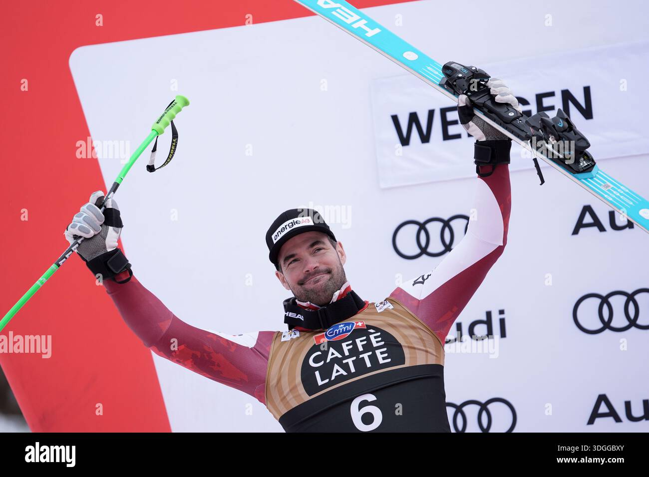 Austria's Vincent Kriechmayr celebrates on the podium after taking ...