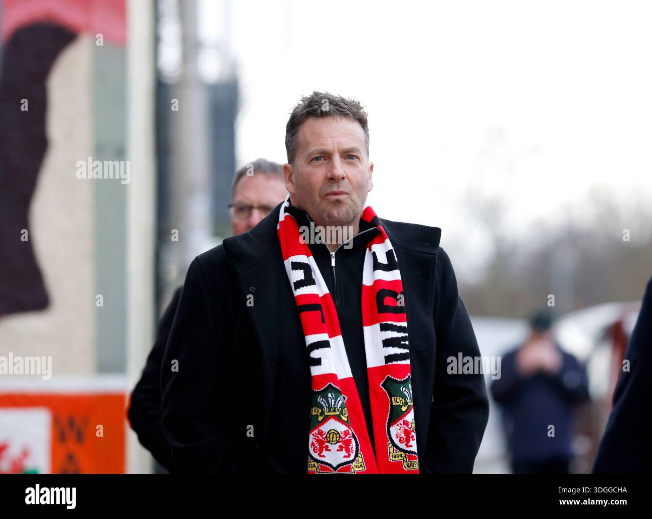 A Wrexham fan before the Sky Bet Championship match at SToK Racecourse ...