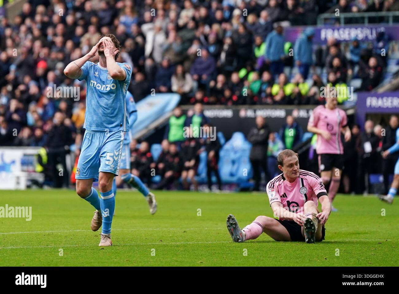 Coventry City's Jack Rudoni (left) reacts after an attempt at goal ...