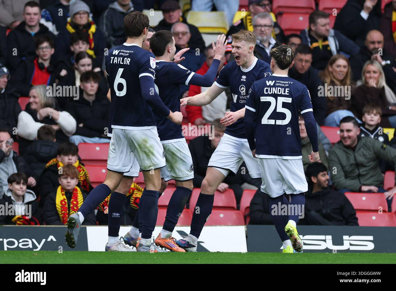 Miilwall players celebrate with Josh Coburn of Millwall after scoring ...