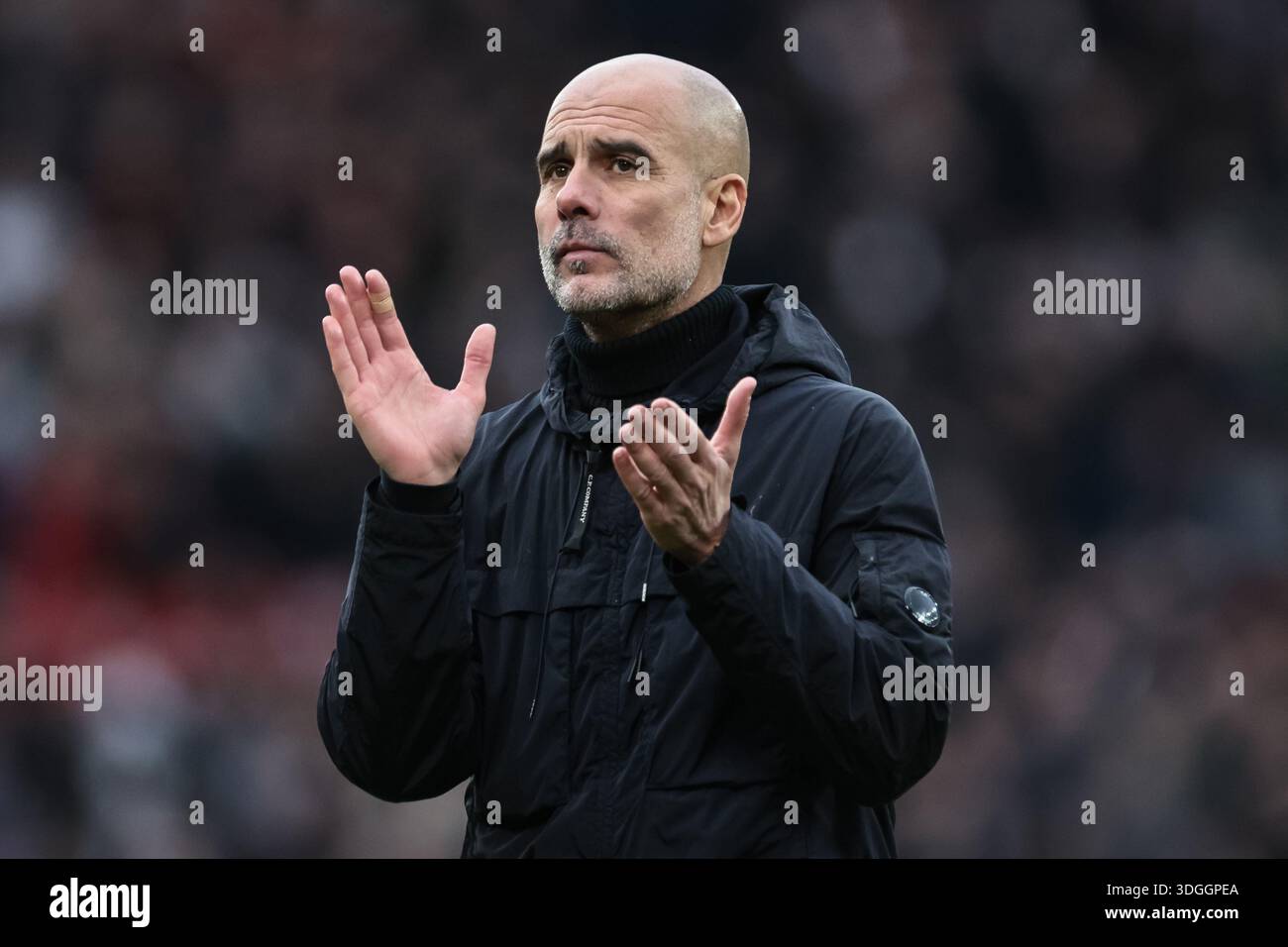 Pep Guardiola manager of Manchester City applauds the fans after the ...