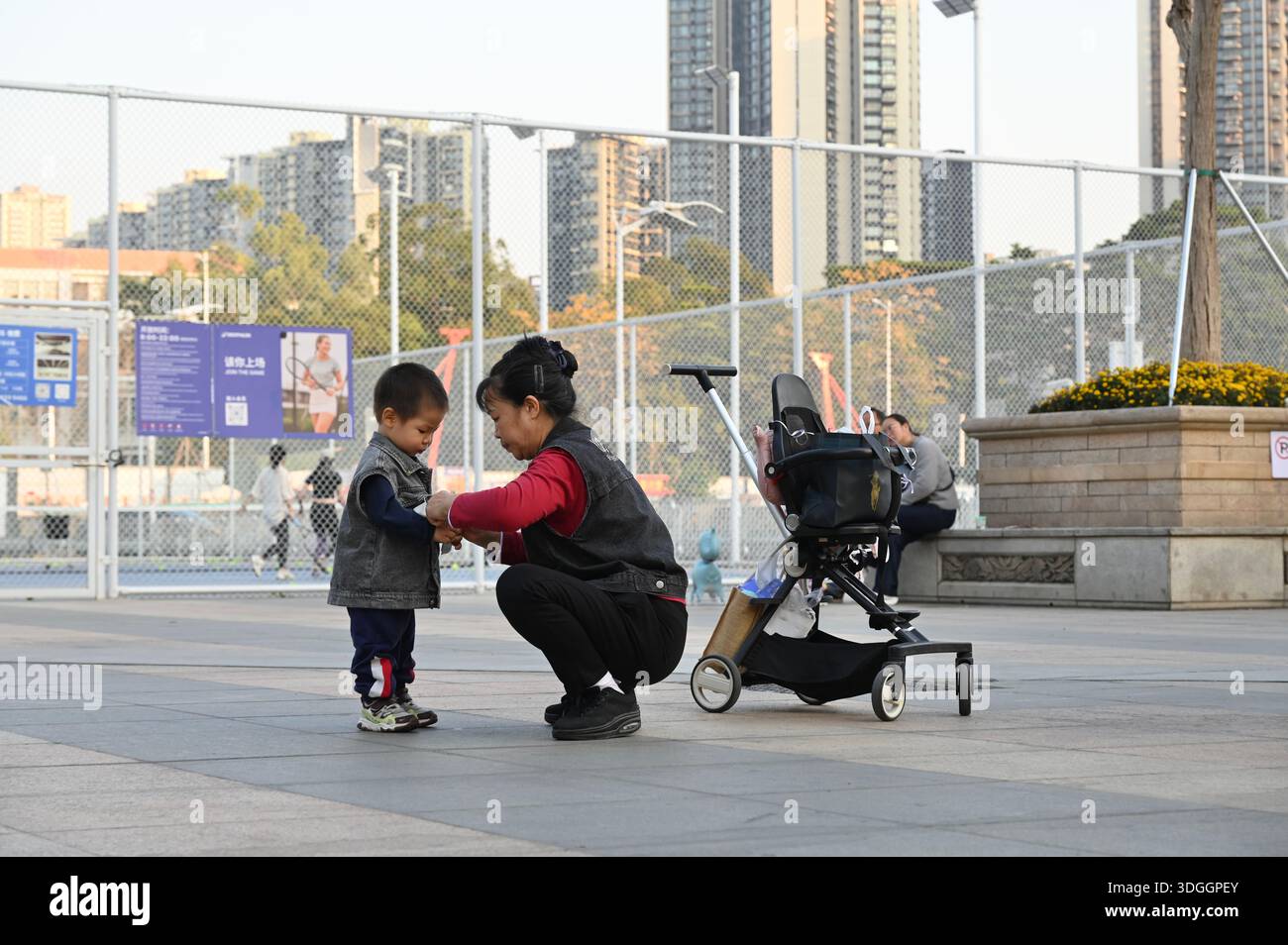 A general view showing the little boy and a woman playing on the ...