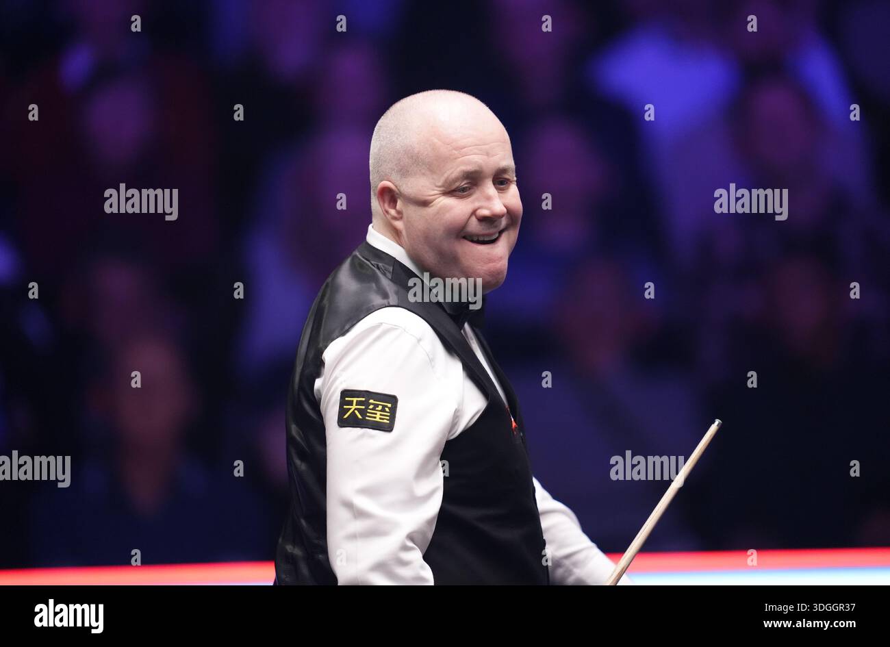 John Higgins reacts after missing a shot on day seven of the 2026 ...
