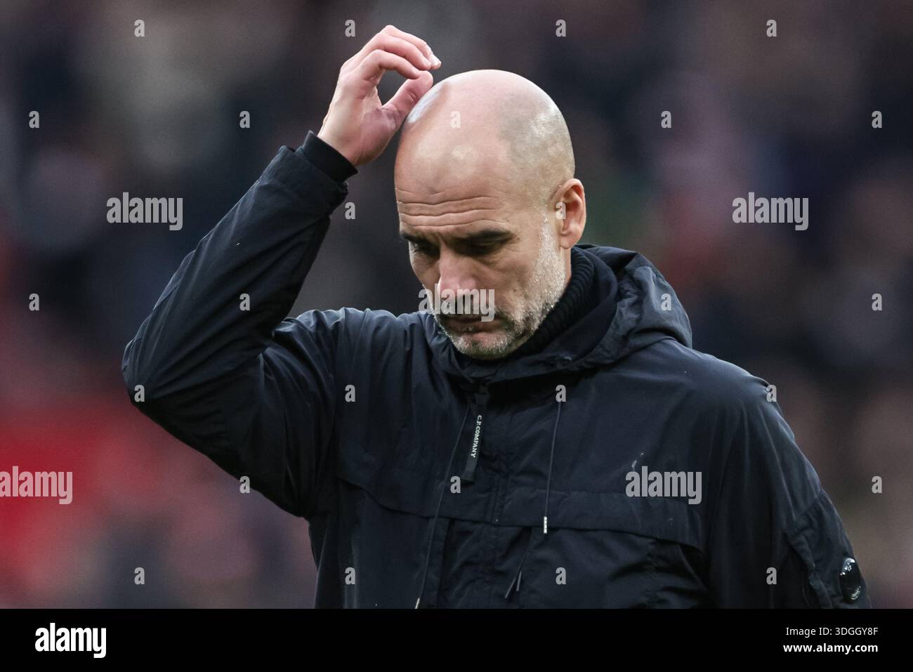 Manchester, UK. 17th Jan, 2026. A dejected Pep Guardiola manager of ...