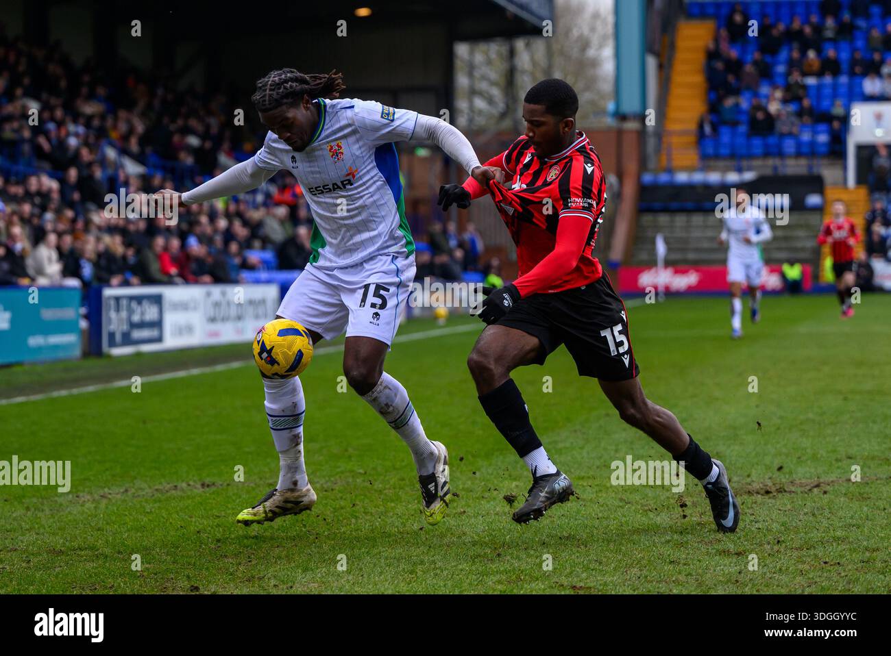 Will Tamen of Tranmere Rovers FC under pressure from, Daniel Kanu of ...