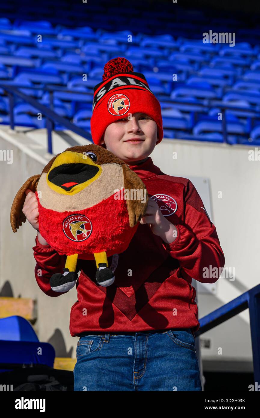 Young Walsall fan with his mascot during the Sky Bet League 2 match ...