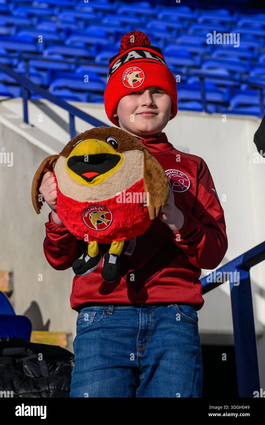 Young Walsall fan with his mascot during the Sky Bet League 2 match ...