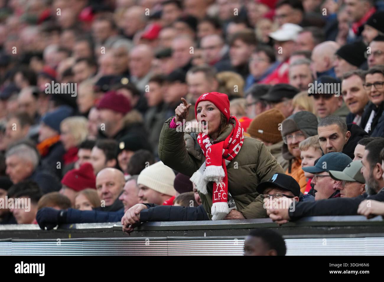 A fan of Liverpool reacts during the English Premier League soccer ...