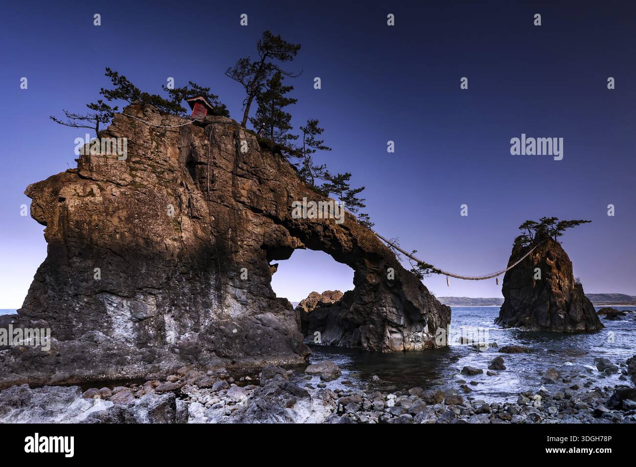 Dramatic rock formations with rope bridge on the Noto Peninsula in ...