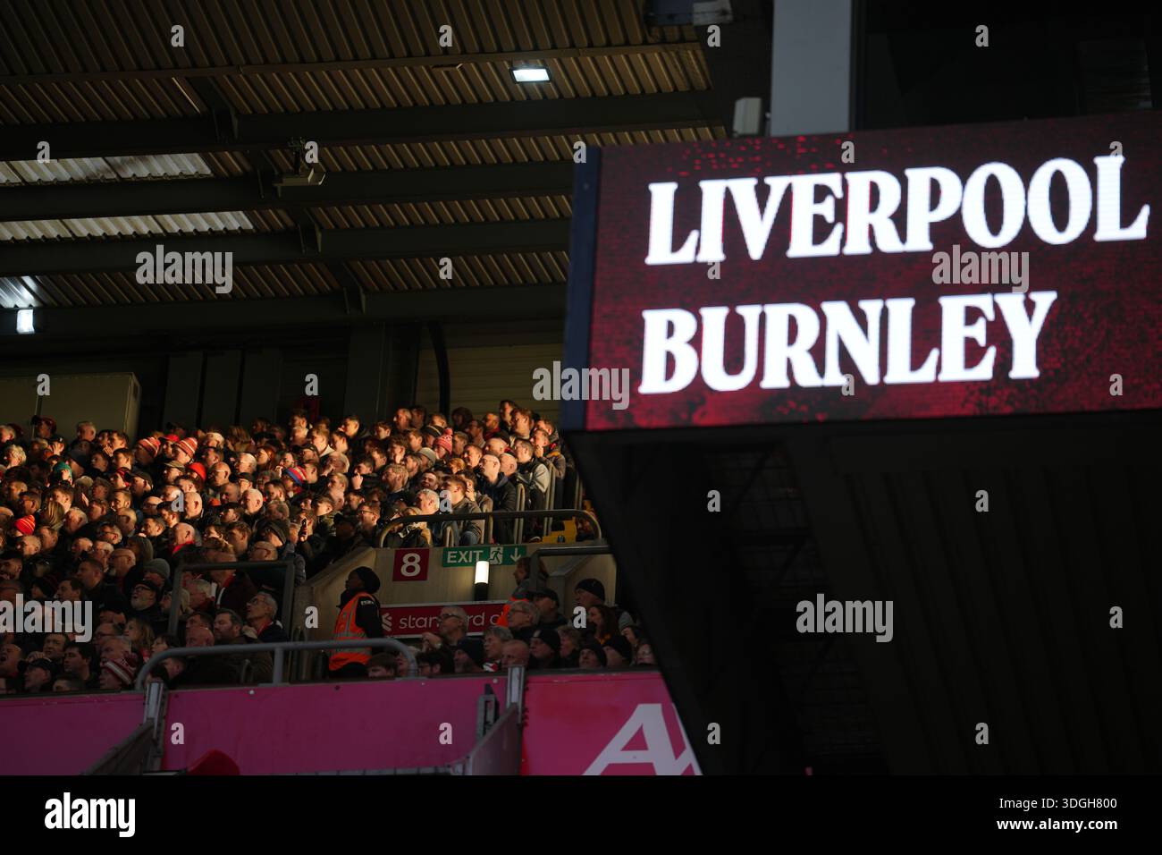 Fans watch the English Premier League soccer match between Liverpool ...