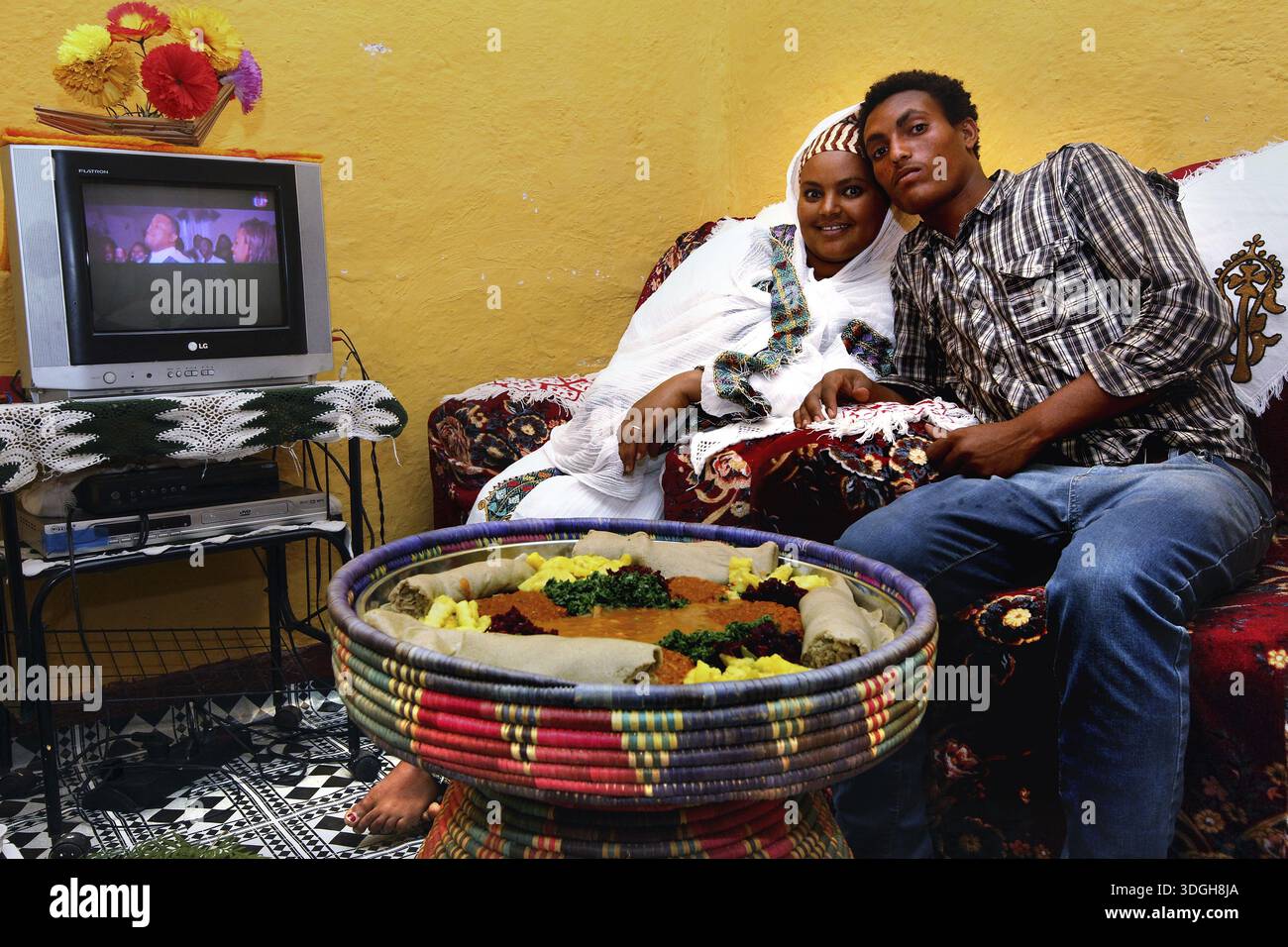 Visiting Worknesh with traditional food in a cozy living room, Lalibela ...