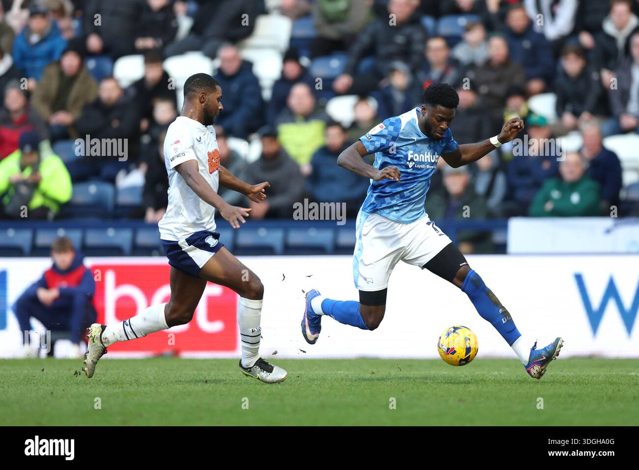 Preston North End's Odel Offiah (left) and Derby County's Patrick ...