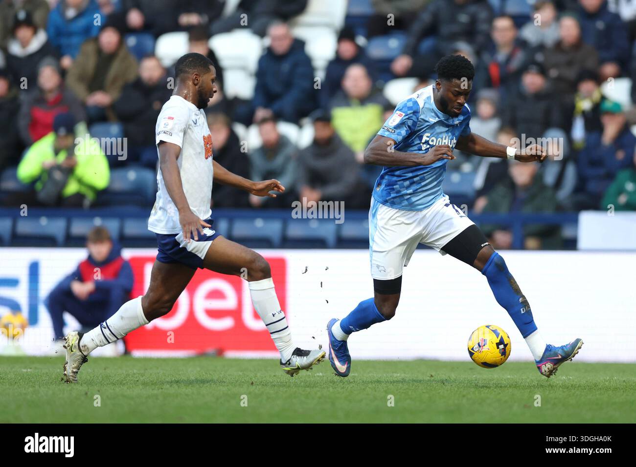 Preston North End's Odel Offiah (left) and Derby County's Patrick ...