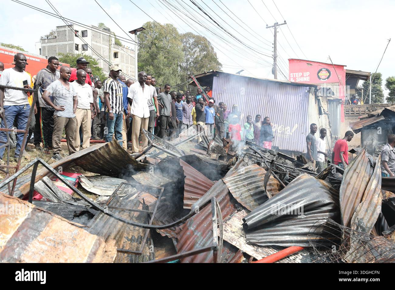 Nairobi, Kenya. 17th Jan, 2026. People gather around the debris of ...