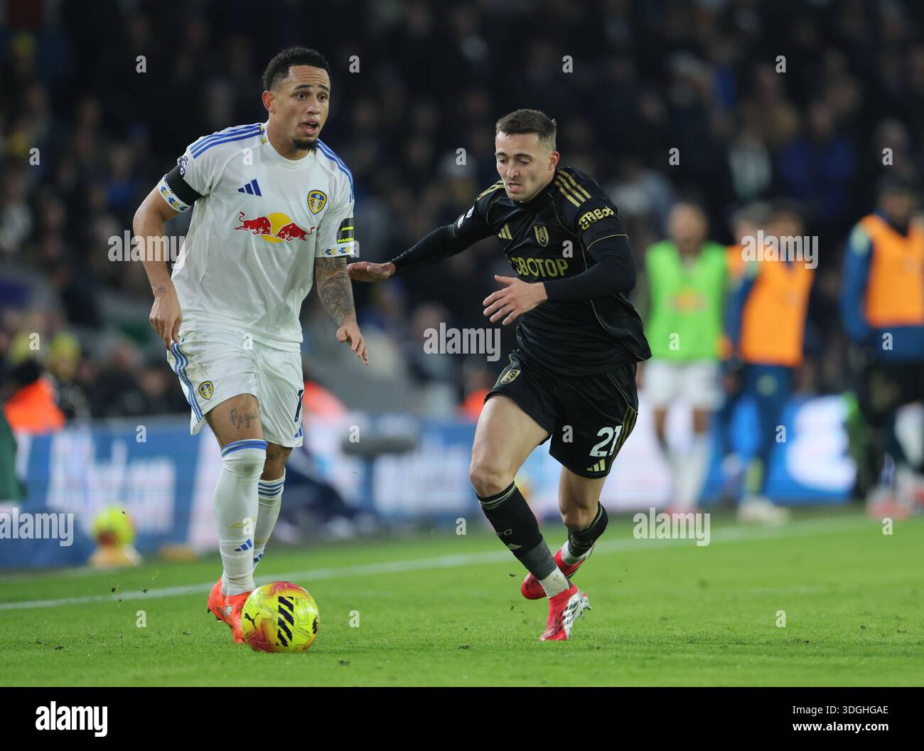 Leeds United's Noah Okafor and Fulham's Timothy Castagne (right) battle ...