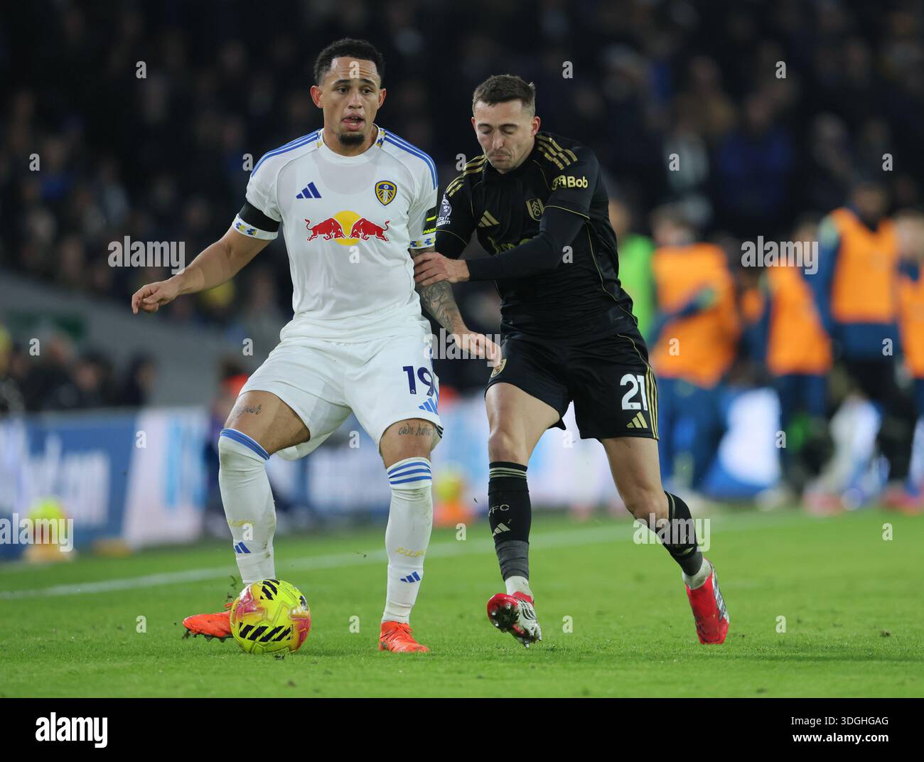 Leeds United's Noah Okafor and Fulham's Timothy Castagne (right) battle ...