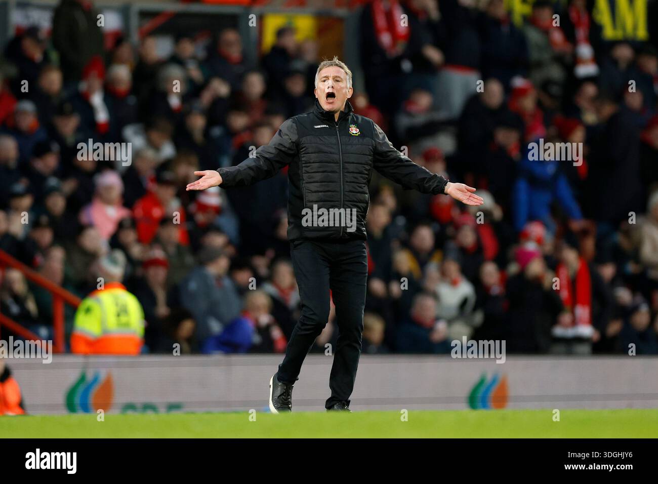Wrexham manager Phil Parkinson encourages the crowd following a medical ...