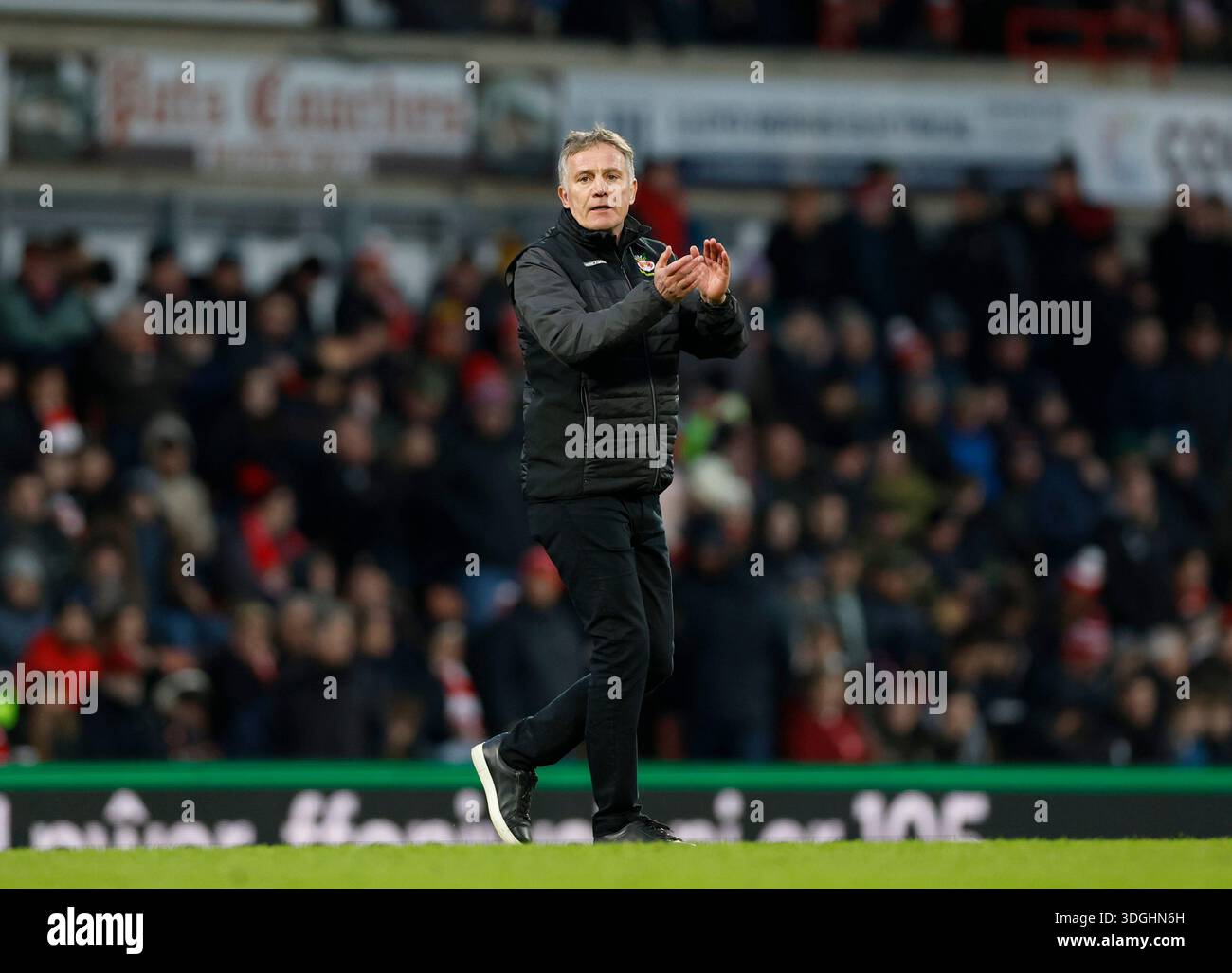 Wrexham manager Phil Parkinson encourages the crowd following a medical ...