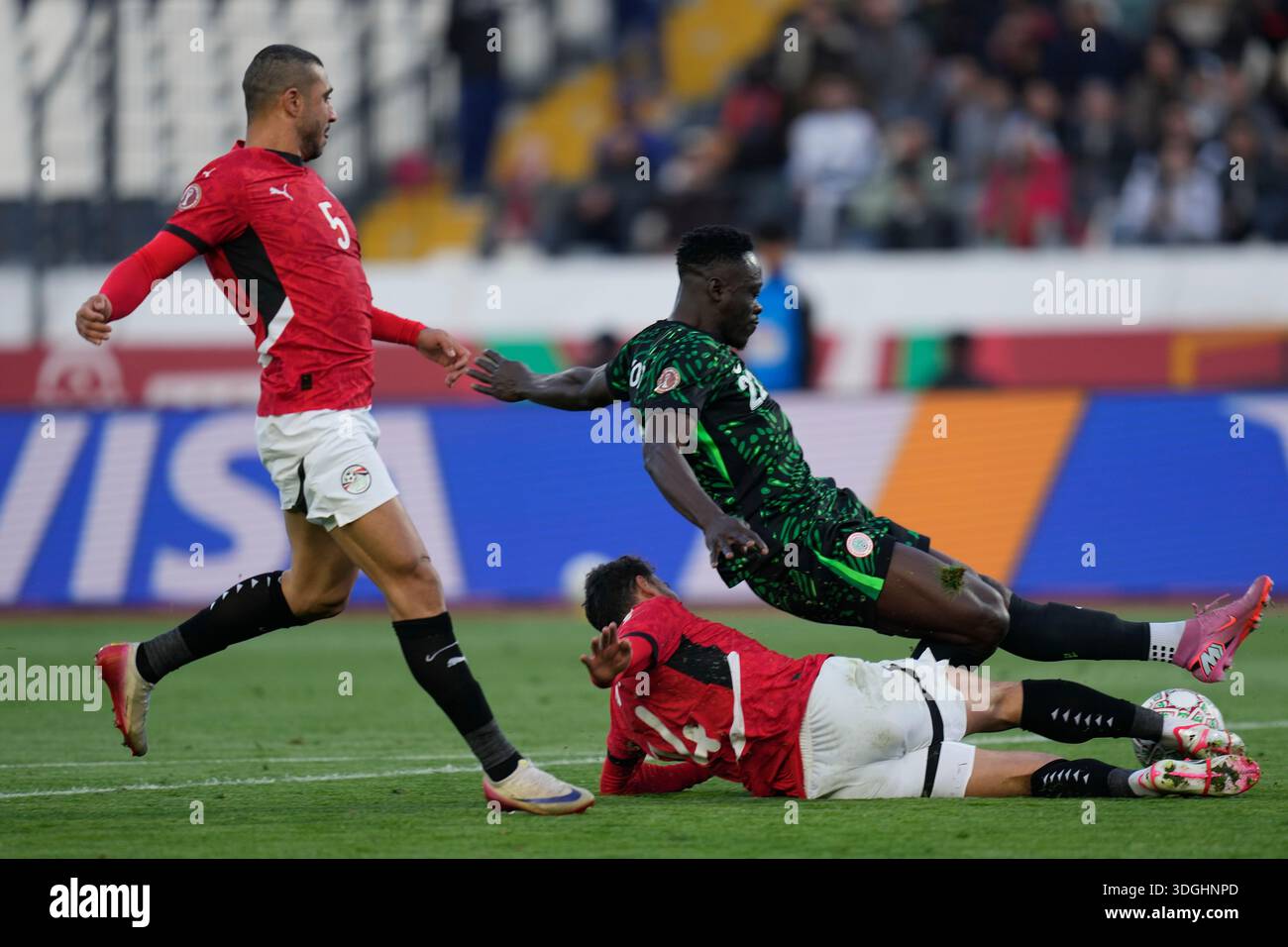 Nigeria's Akor Adams is challenged by Egypt's Hamdy Fathy during the ...